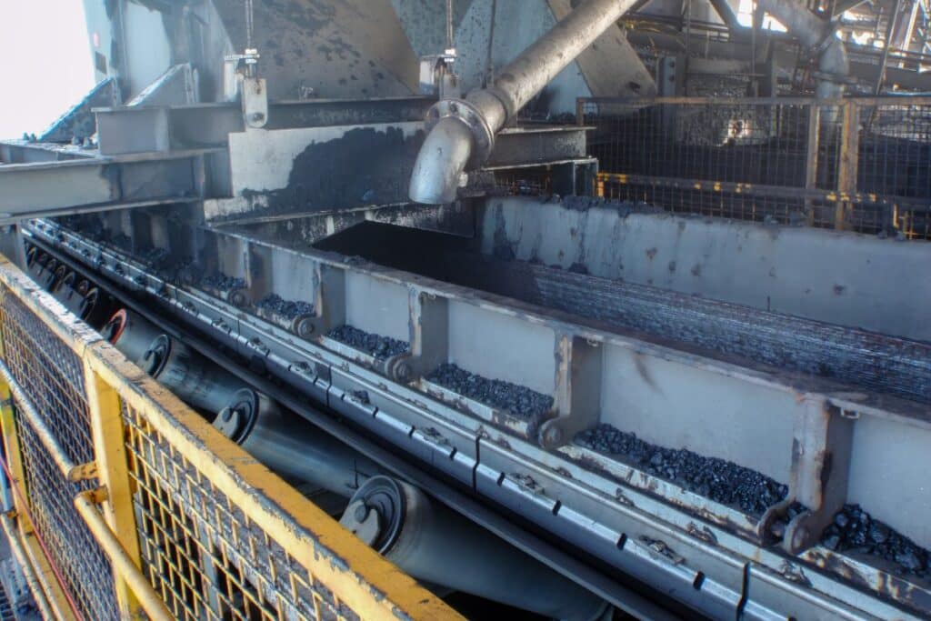 Tackling dust and damage at conveyor load zones - Australian Bulk ...